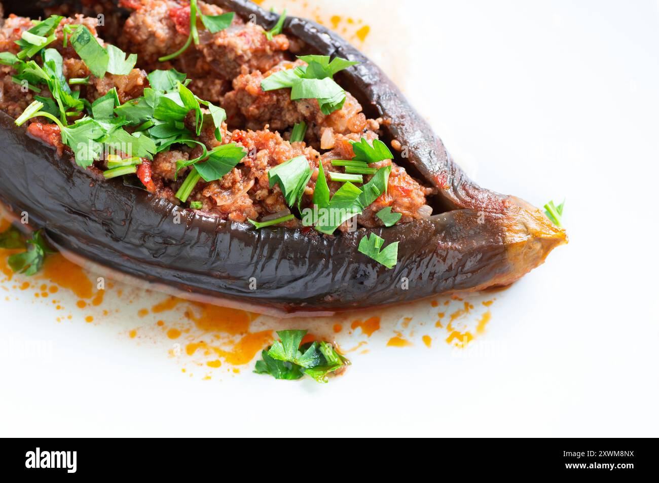 Traditional Turkish food stuffed eggplant, meat, tomato and spices ...