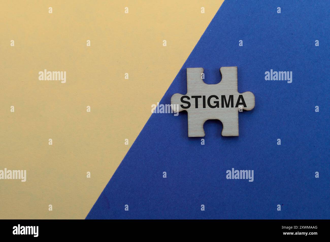 Overcoming social stigma concept. Single puzzle piece with the word ...