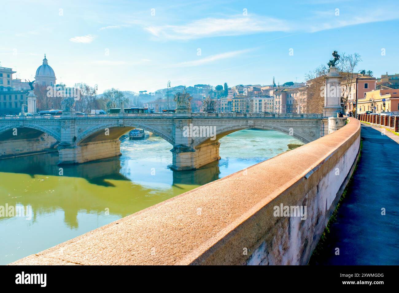 The historic Ponte Vittorio Emanuele II bridge across Tiber River in ...