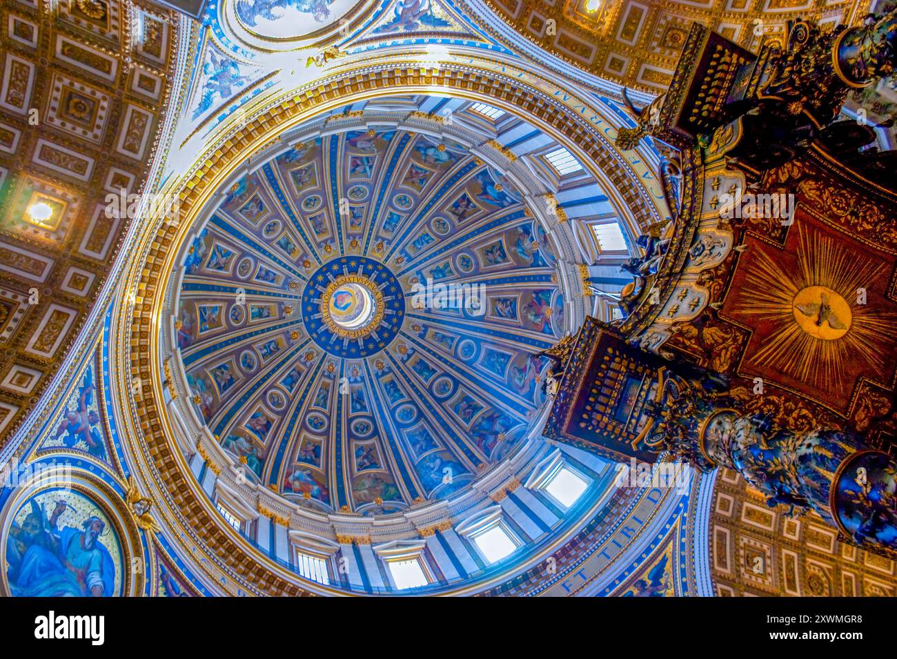 VATICAN CITY - JANUARY 13, 2019: The huge Dome of St. Peter's Basilica and carved St. Peter's ...