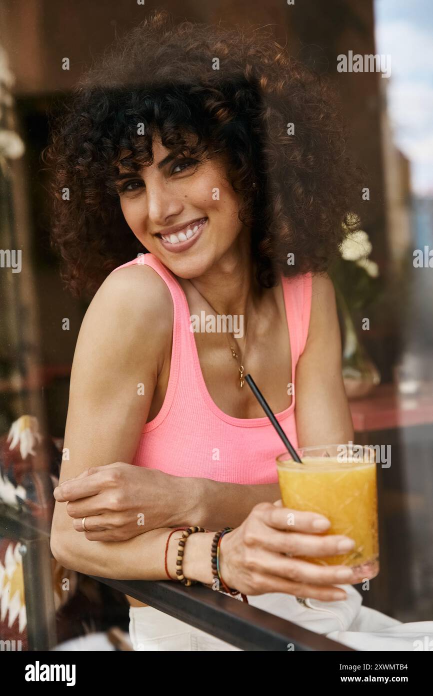 Female enjoying refreshing orange hi-res stock photography and images ...
