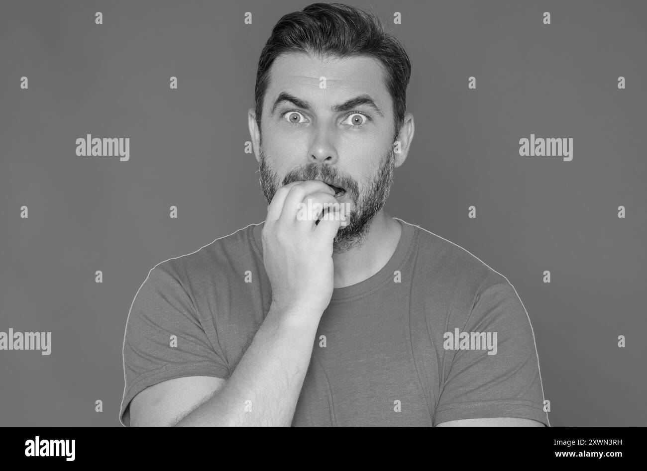 Portrait thoughtful hispanic guy in Black and White Stock Photos ...