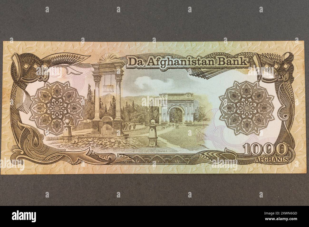 Afghanistan 1000 Afghanis banknote featuring Taq-e Zafar and Lion Gate ...