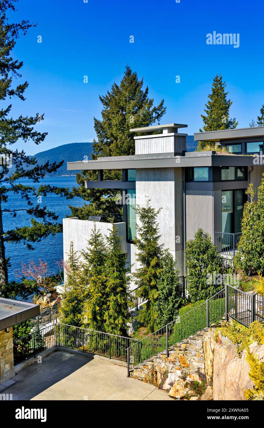 Corner of a residential house with Pacific ocean bay overview Stock ...