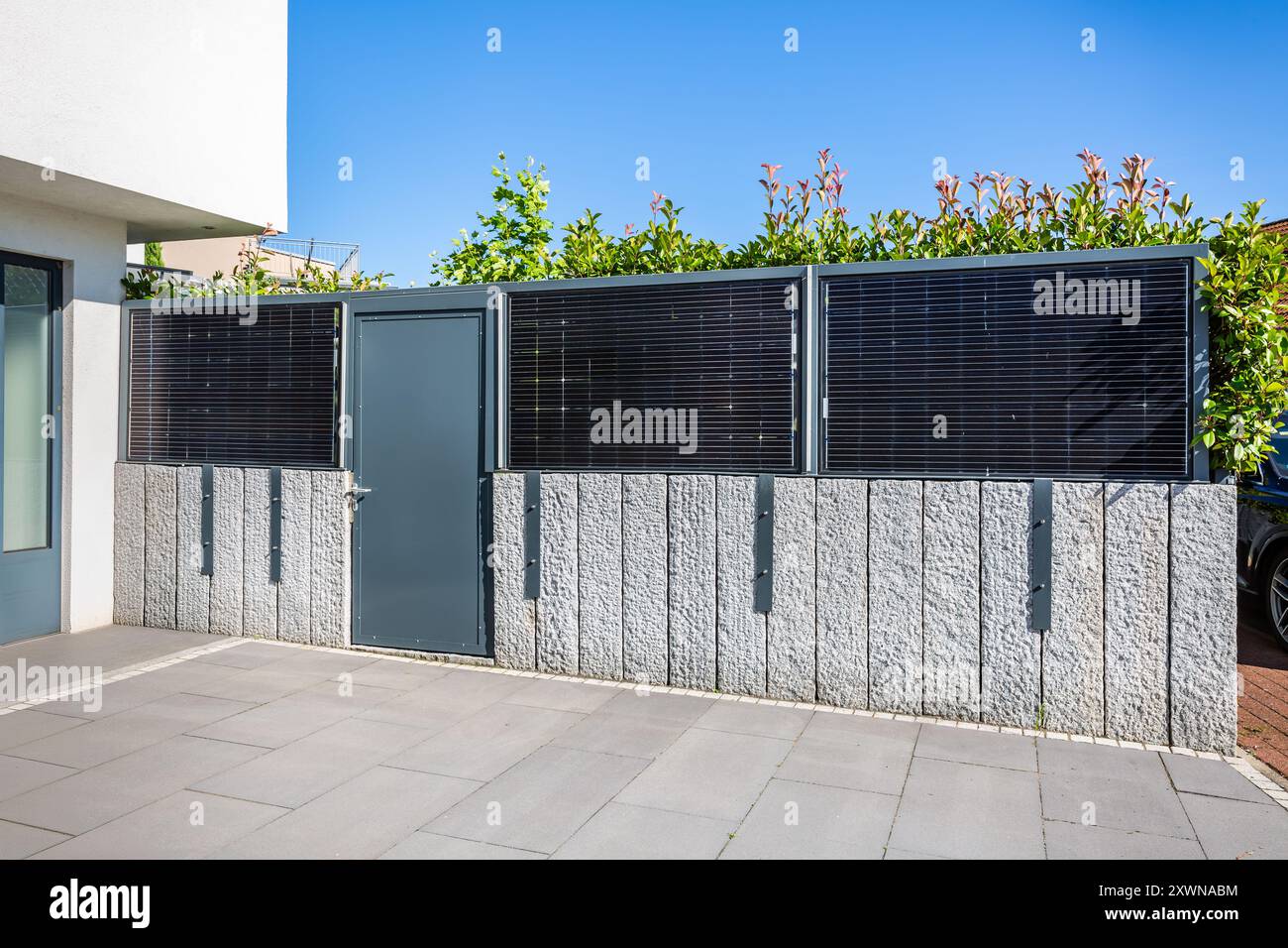Balcony solar power plant mounted on garden fence. Modern Balcony ...