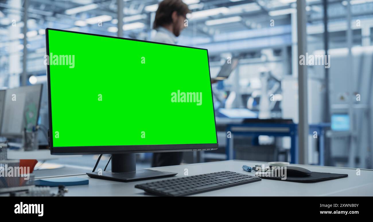 Modern Industrial Manufacture with Desktop Computer with Green Screen ...