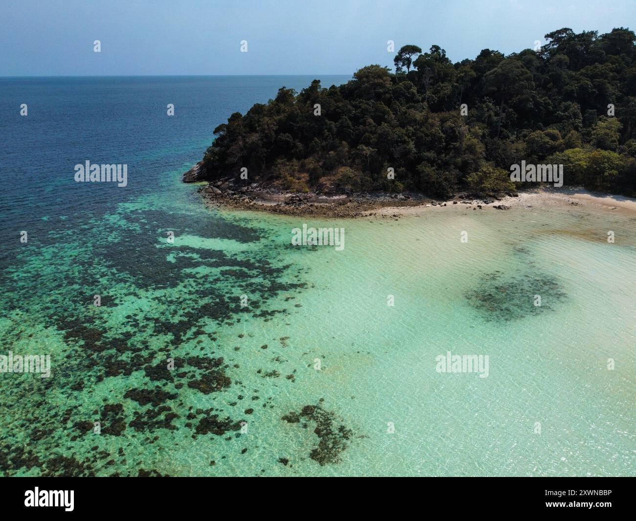 Aerial view of Koh Ra Wi, its beautiful coral reefs and turquoise water ...