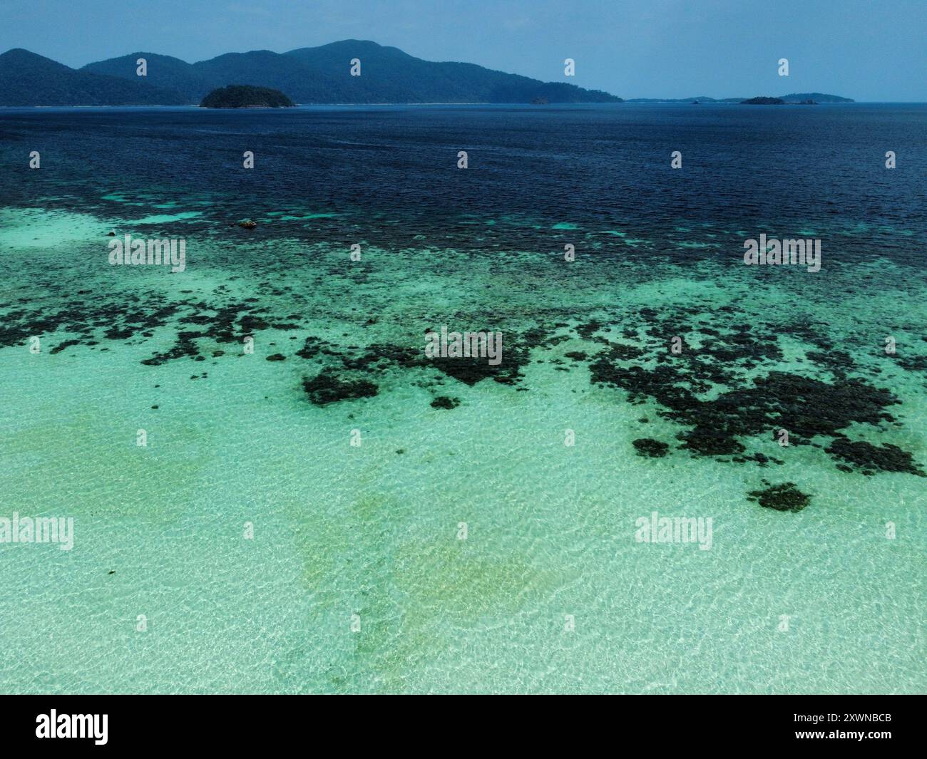 Aerial view of Koh Ra Wi, its beautiful coral reefs and turquoise water ...