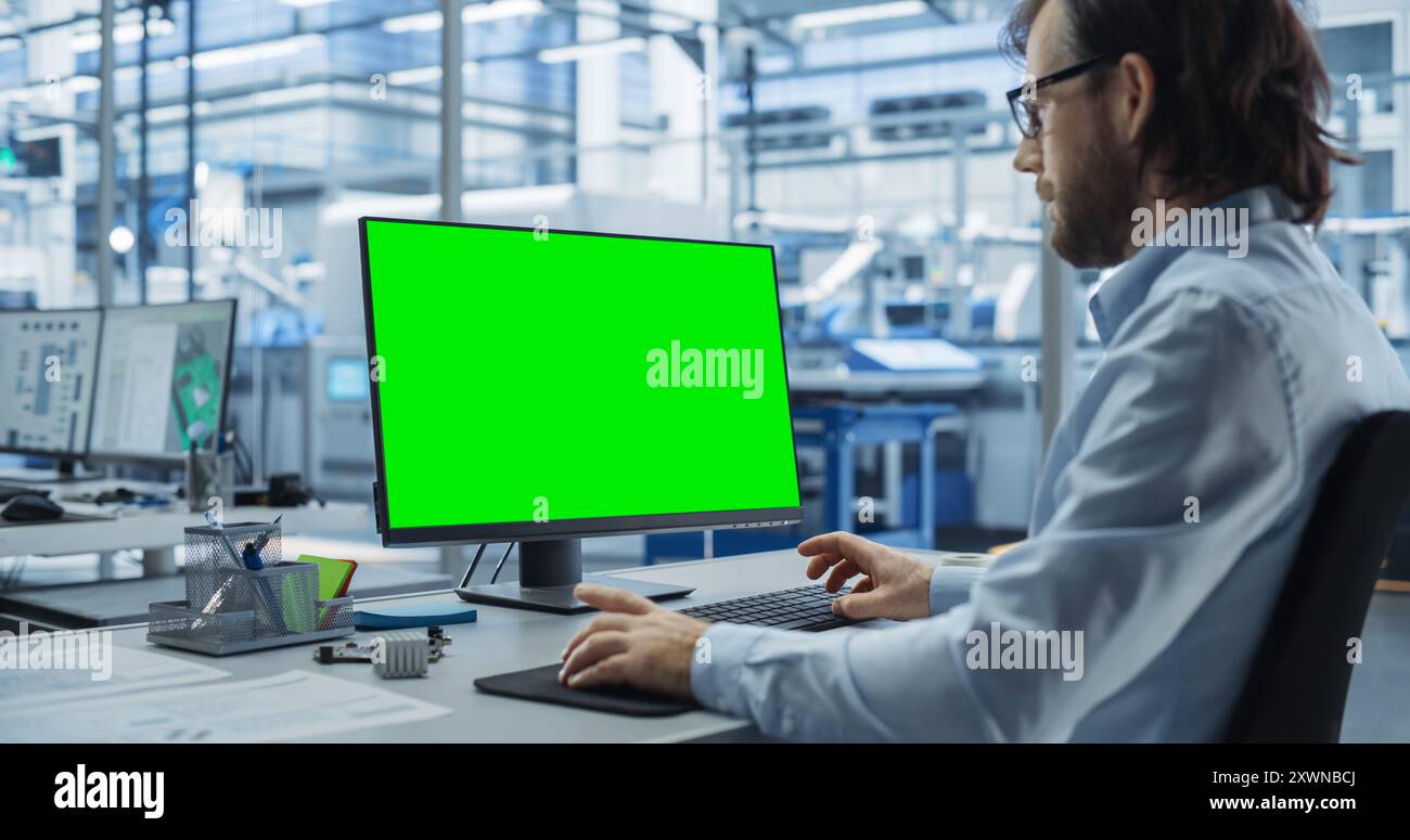 Factory engineer using green screen hi-res stock photography and images ...