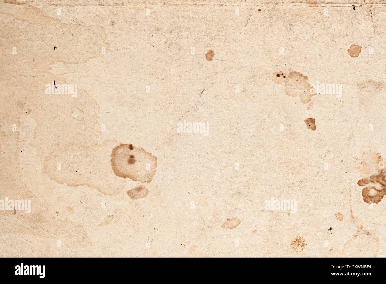 Textured old paper with stains and wear, vintage background Stock Photo ...