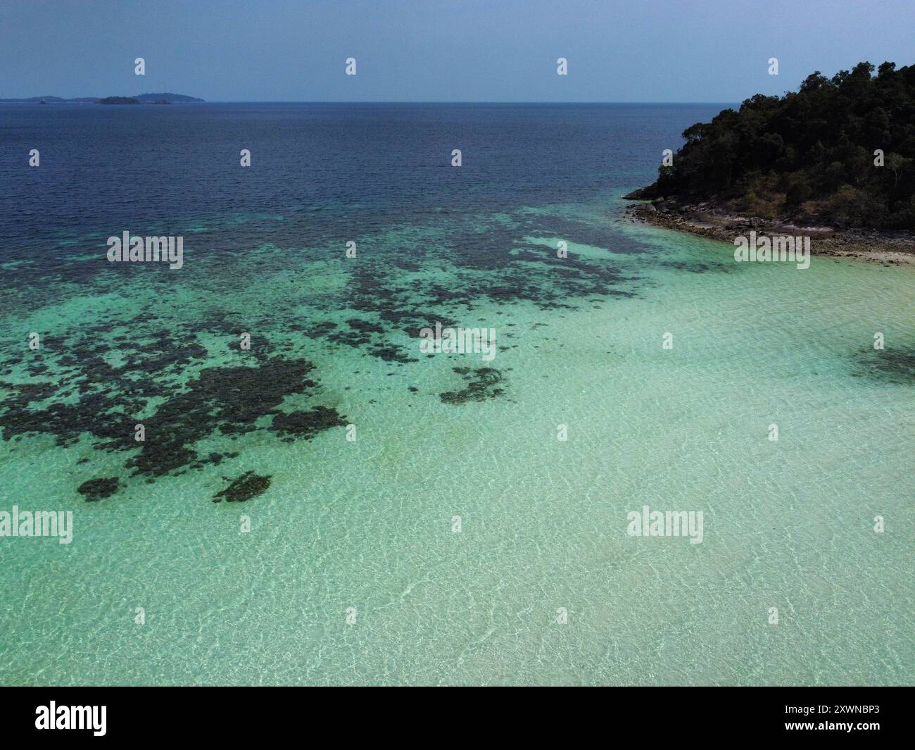Aerial view of Koh Ra Wi, its beautiful coral reefs and turquoise water ...