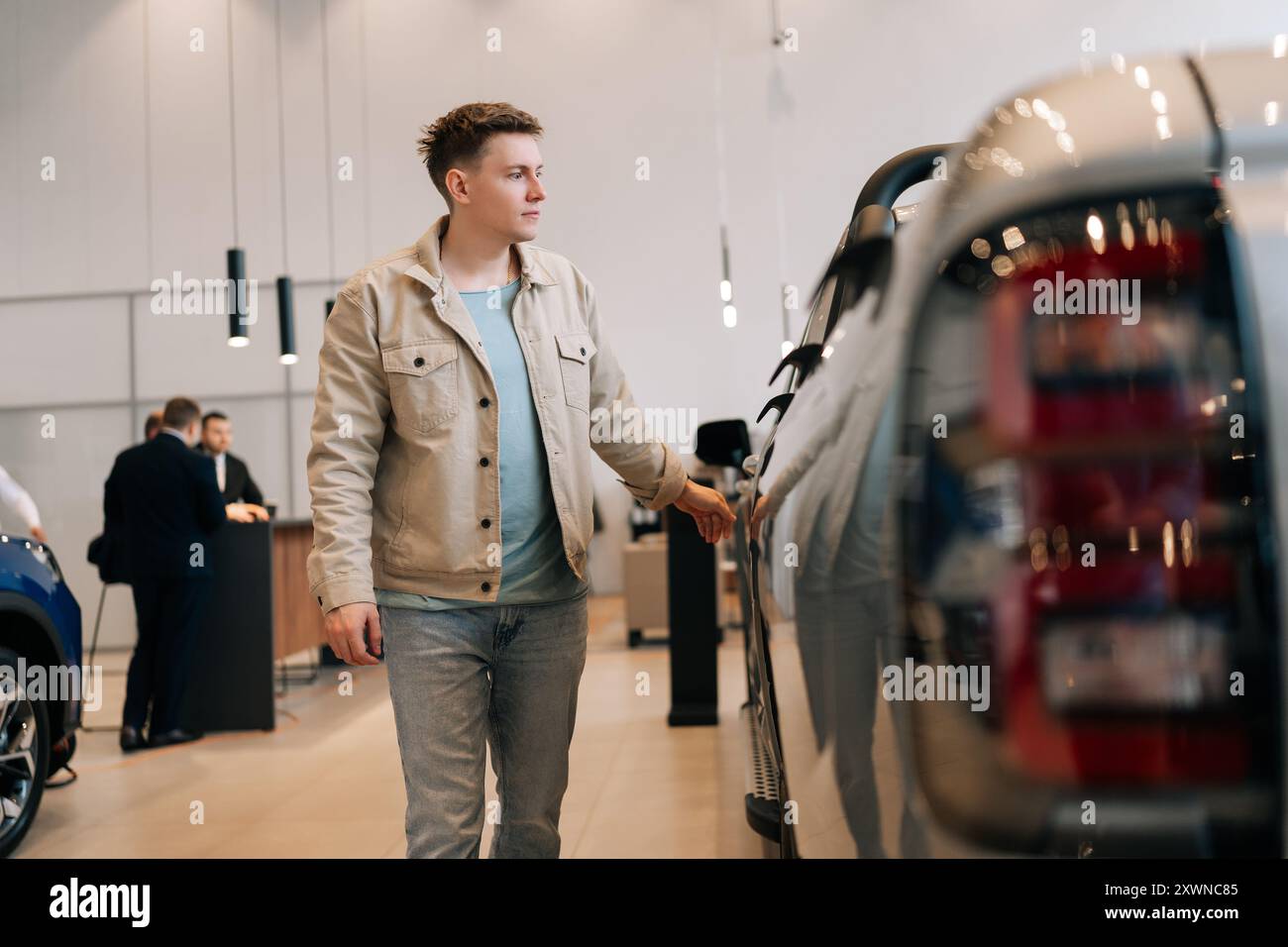 Car exhibition people walking buying hi-res stock photography and ...
