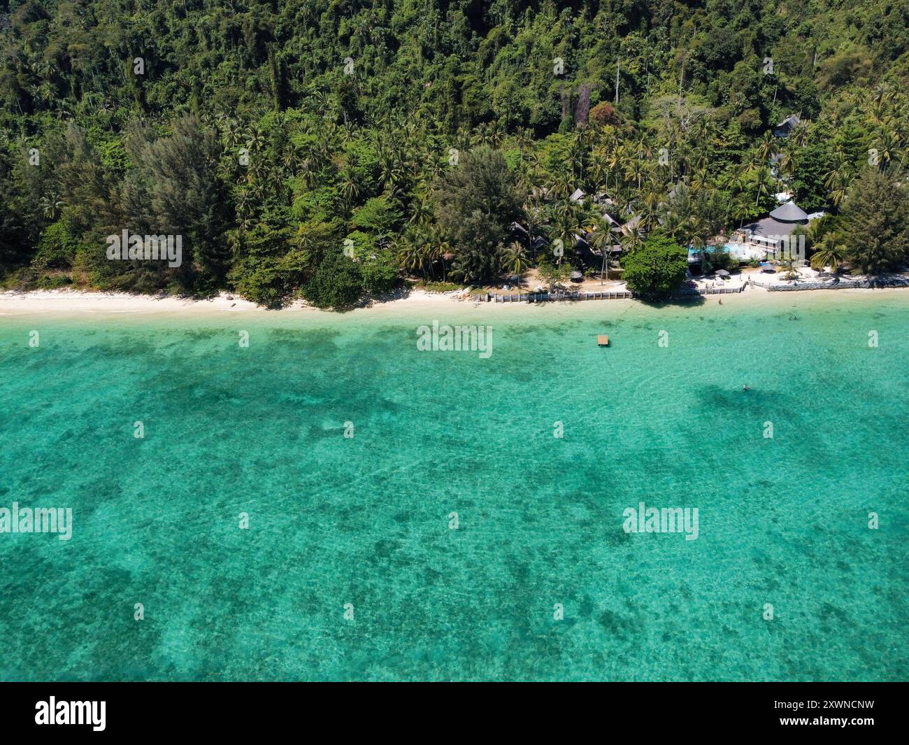 Aerial view of the Ko Ngai beach in the morning with a long sandy beach ...