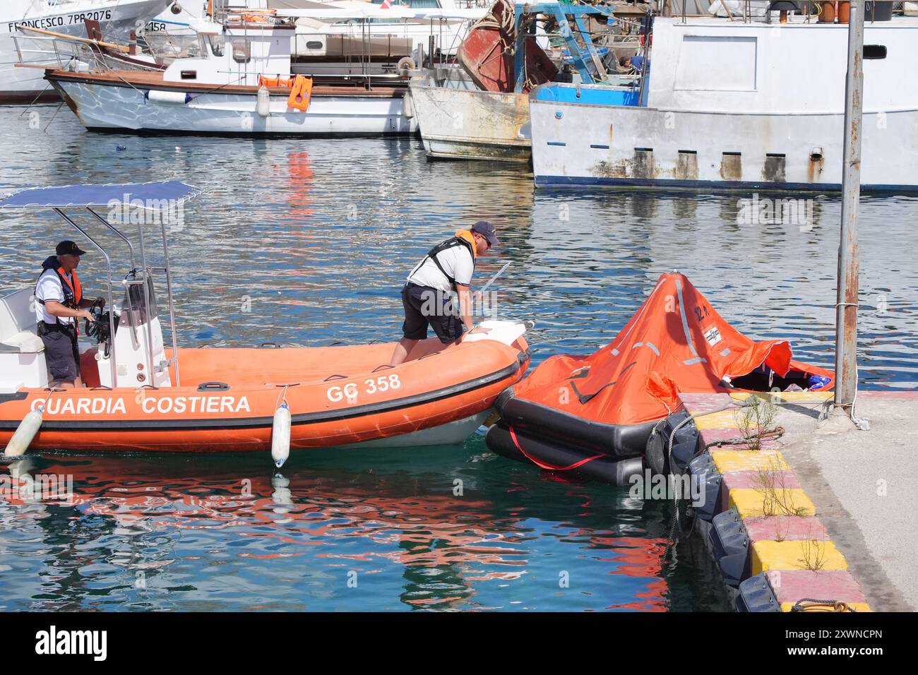 The coastguard handle a rapid inflatable emergency lifeboat in ...