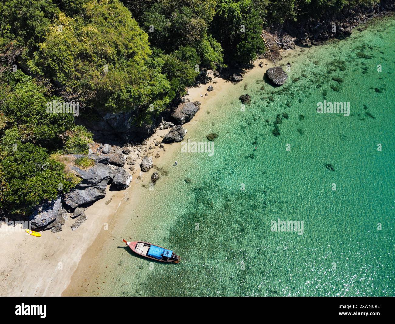 Aerial view of long tail boat on the turquoise waters of the Sabai ...