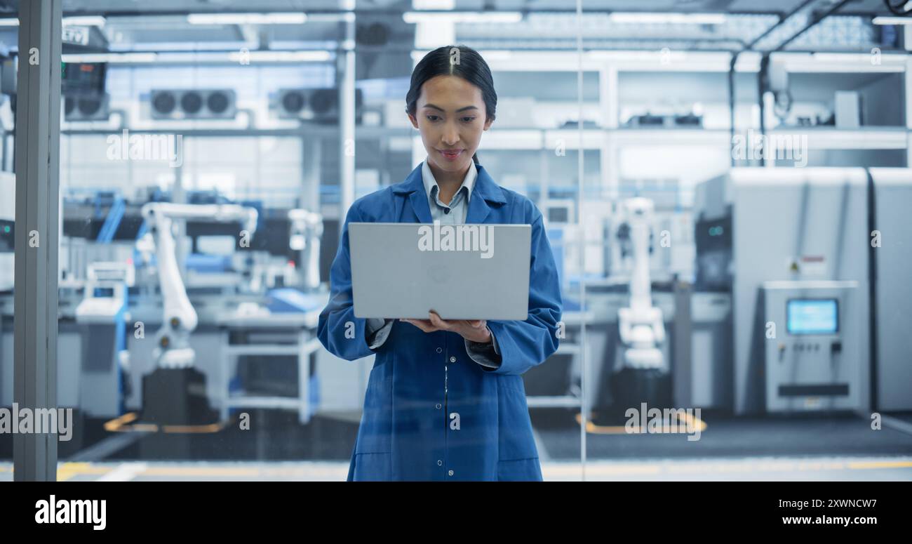 Portrait of a Beautiful Electronics Manufacture Engineer Smiling and ...