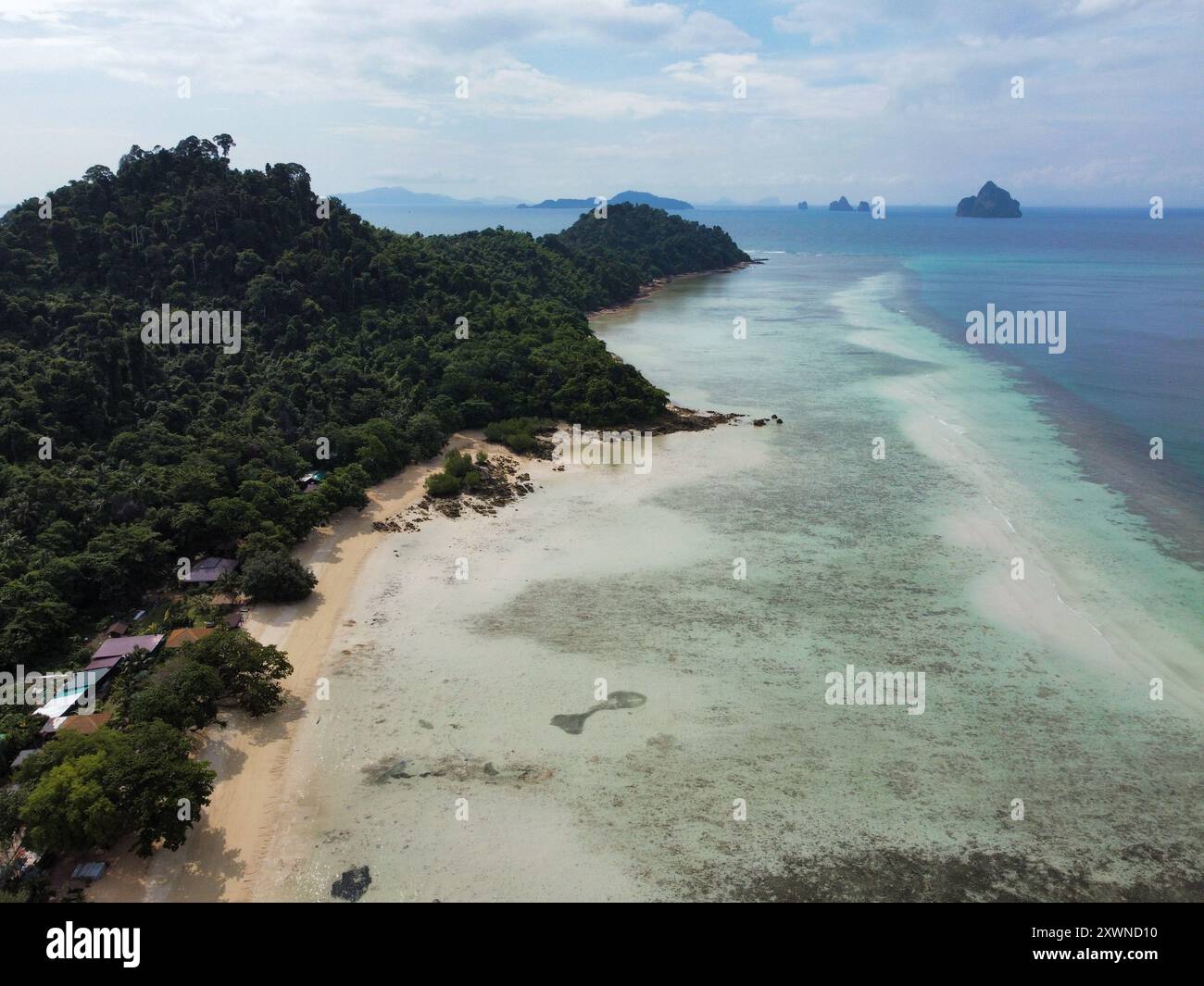 Aerial view of the Koh Kradan beach at low tide, with the coral reef on ...