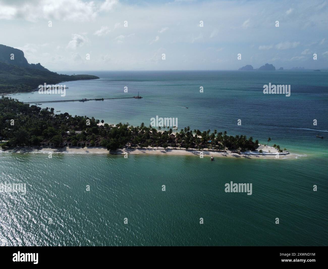 Aerial view of the sand peninsula of Ko Muk island with the pier in the ...