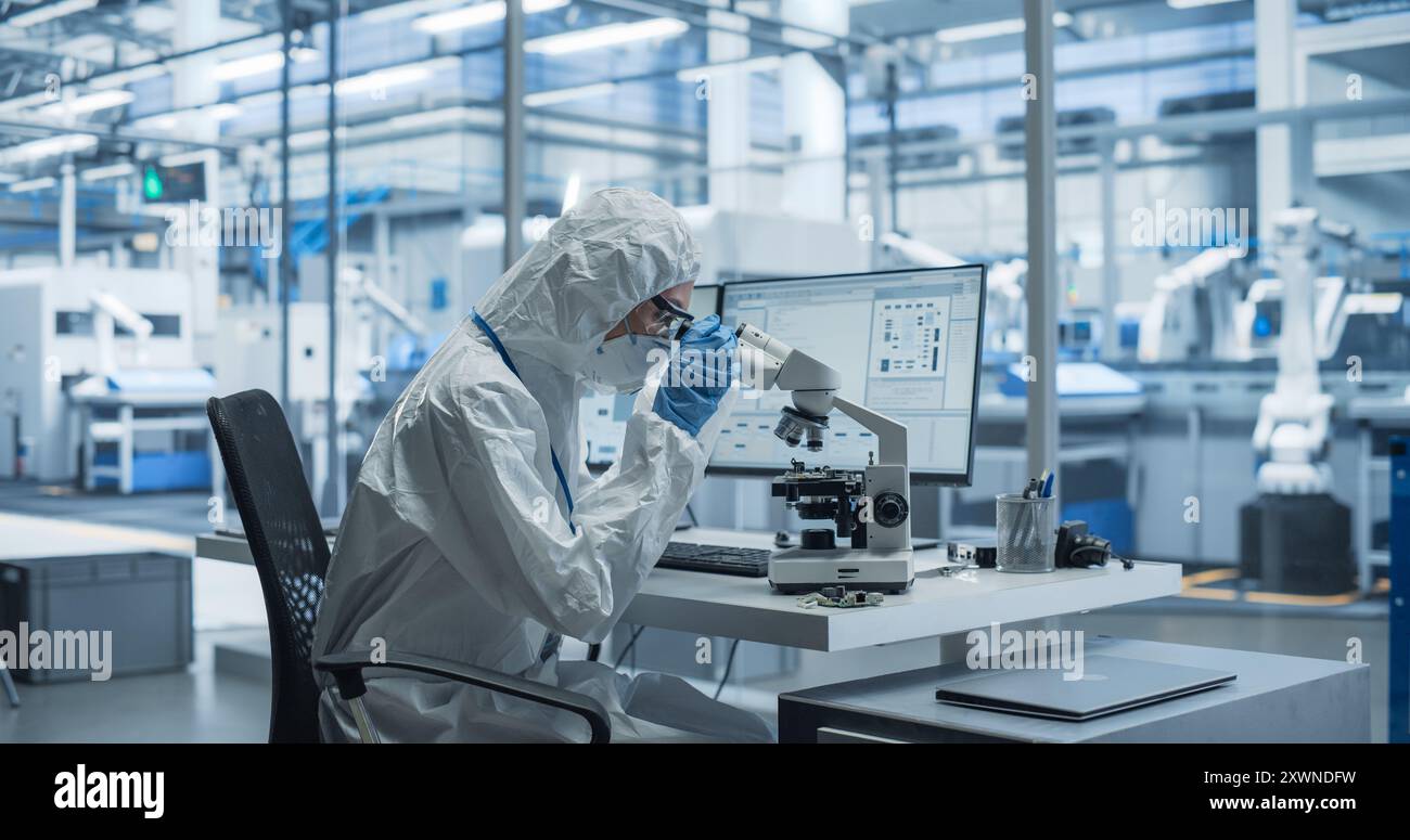 Cleanroom worker microscope hi-res stock photography and images - Alamy