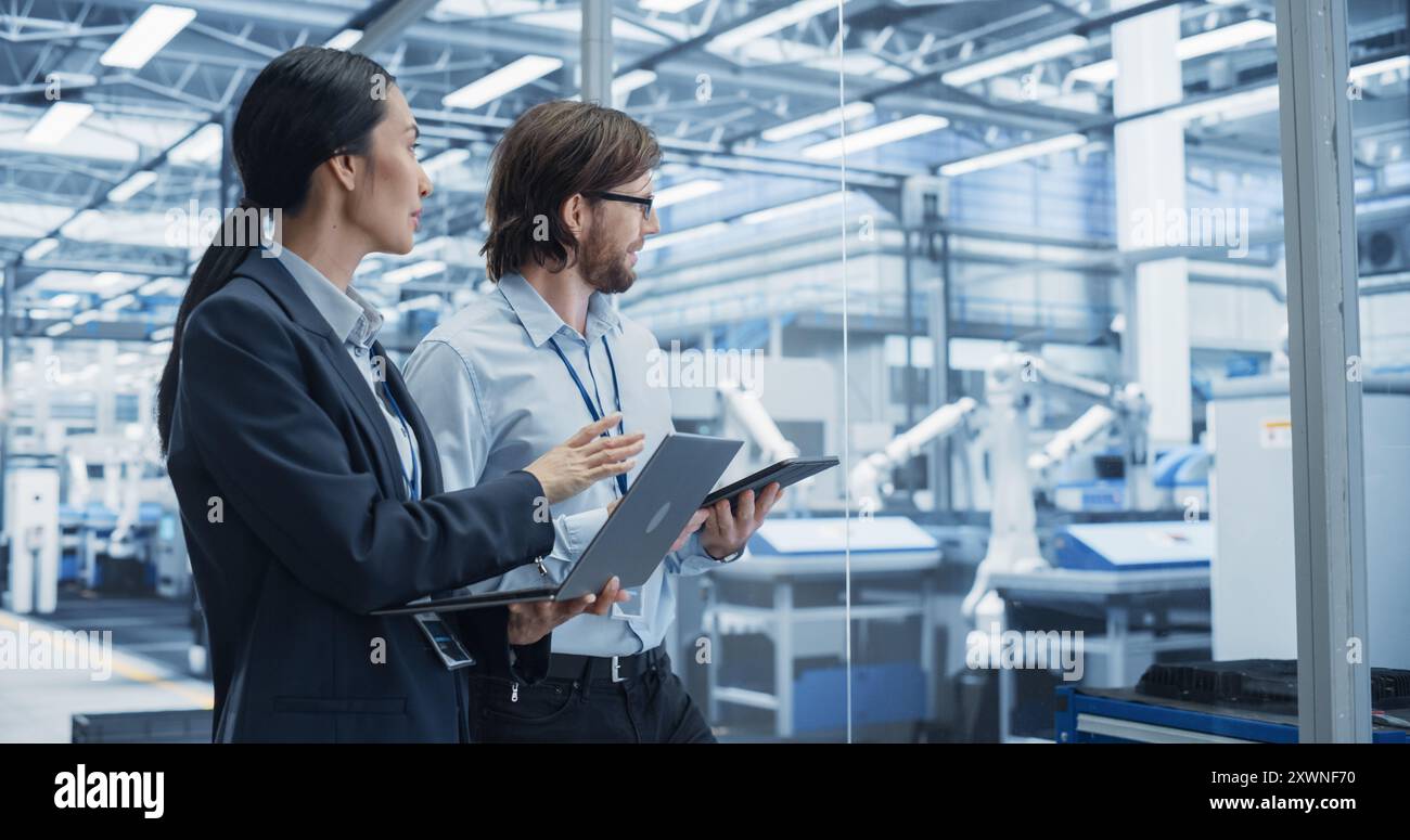 Laptop computers in electronic factory hi-res stock photography and ...