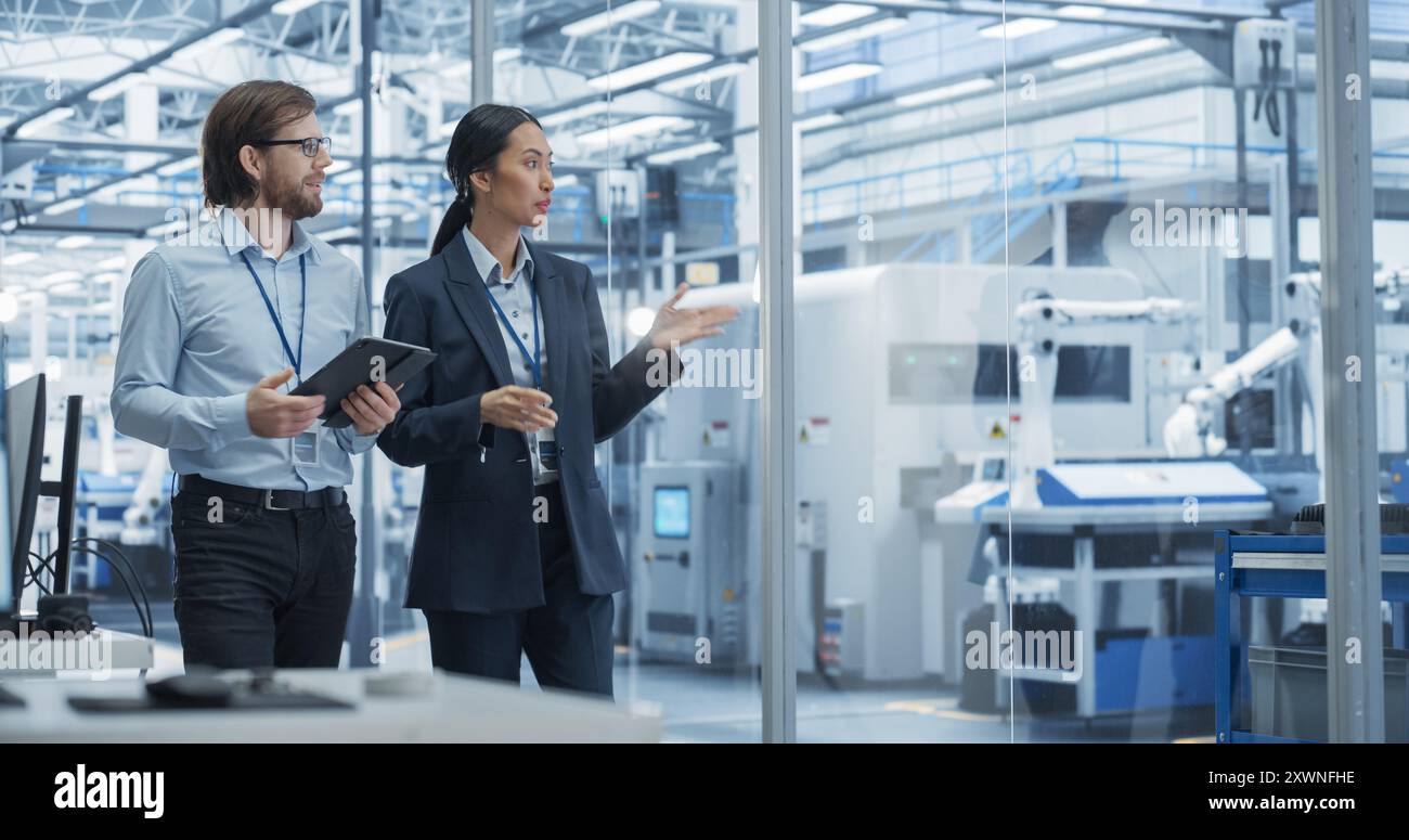 Team diverse engineers walking hi-res stock photography and images - Alamy