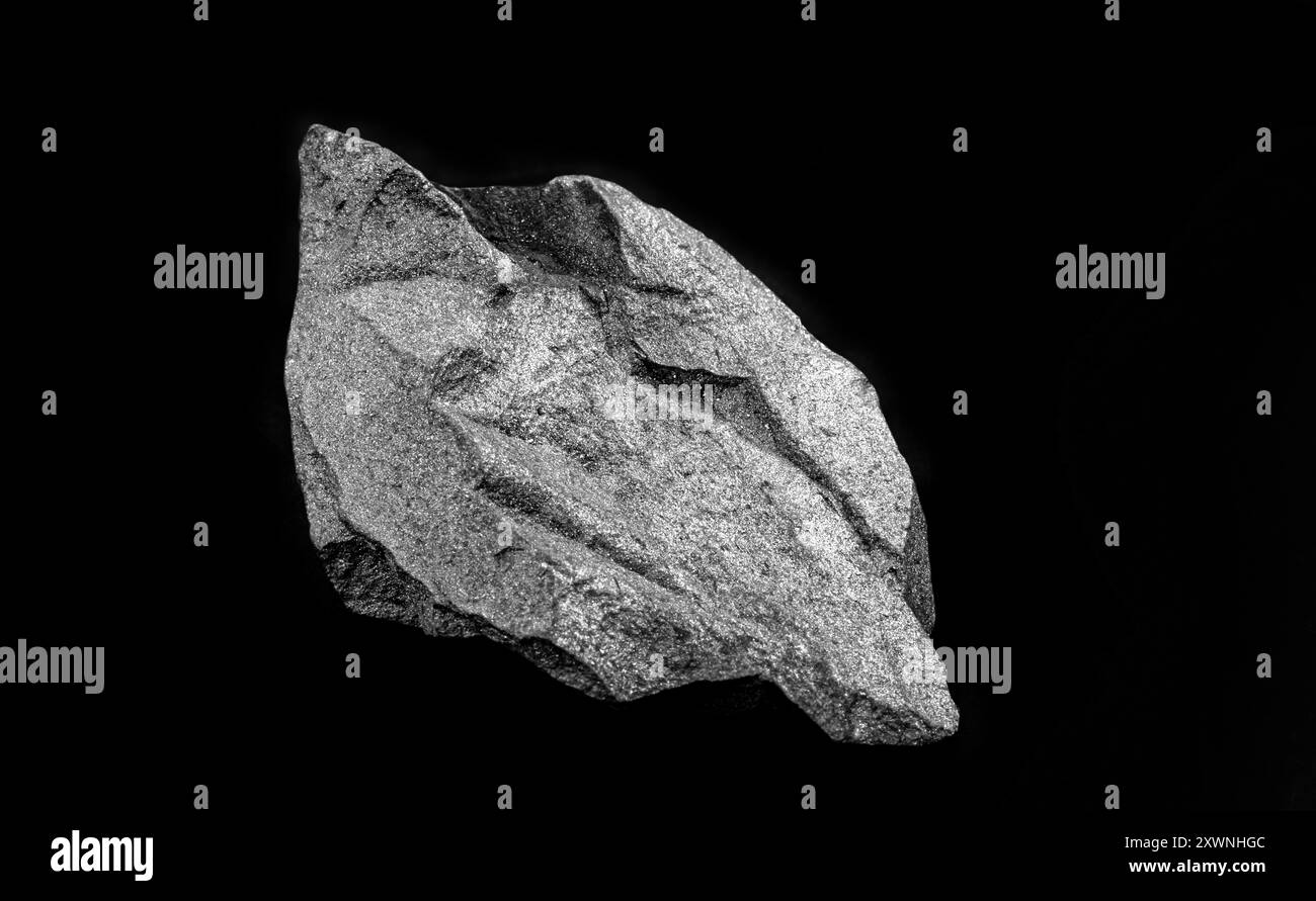 Iron ore on isolated black background, metal used in metallurgical ...