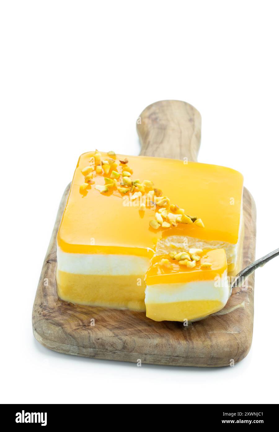 Sweet homemade mango dessert layered cheesecake isolated on white Stock ...