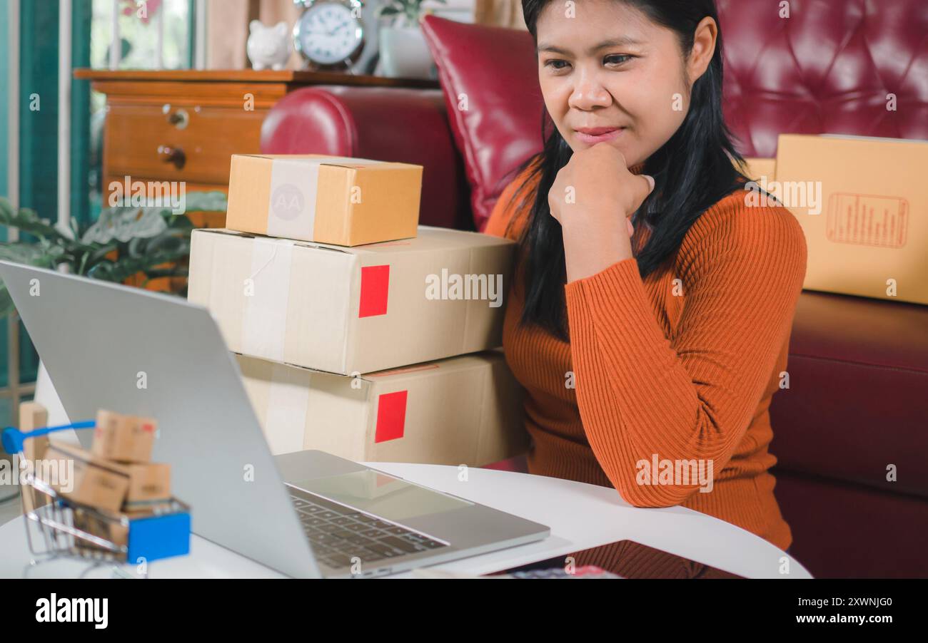 Happy women checking order hi-res stock photography and images - Alamy