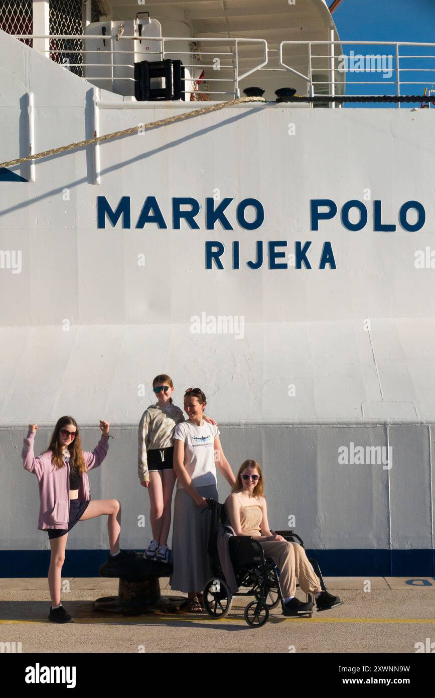 Family of foot passengers wait to board the Jadrolinija 'Marko Polo ...