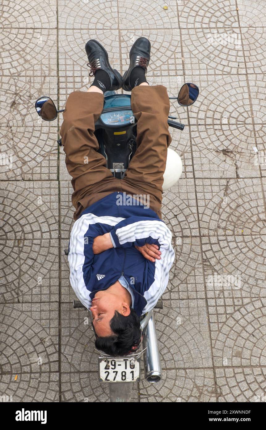 Commuter hanoi moped hi-res stock photography and images - Alamy