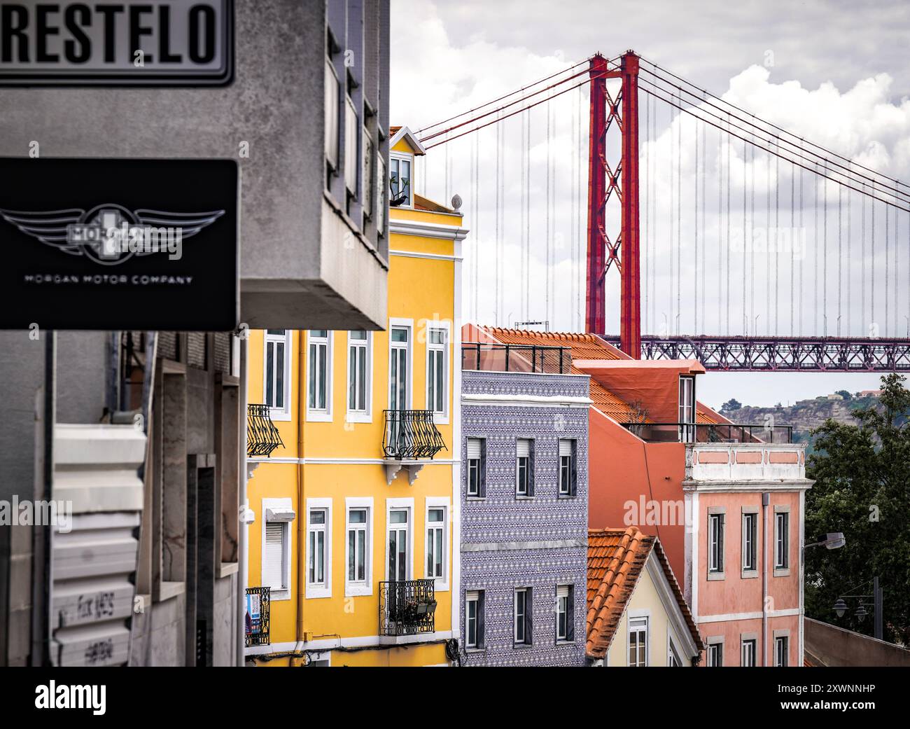Lisbon, Portugal, Street and view on Lisbon’s famous bridge from Ajuda ...