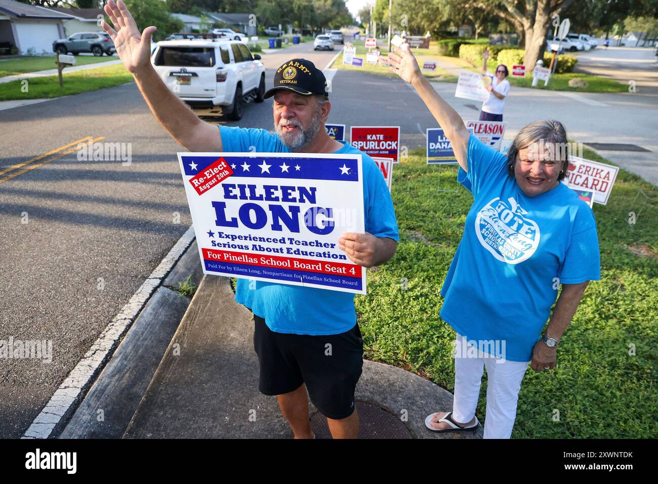 Robert Long, left, supports his wife, Eileen Long, while campaigning ...