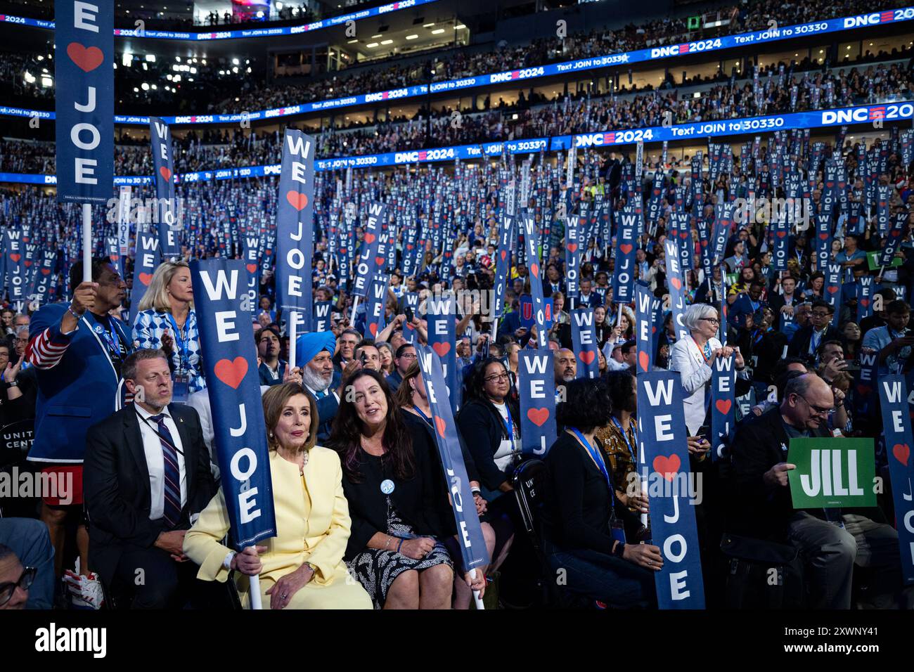 Chicago, United States Of America. 19th Aug, 2024. The crowd holds up ...