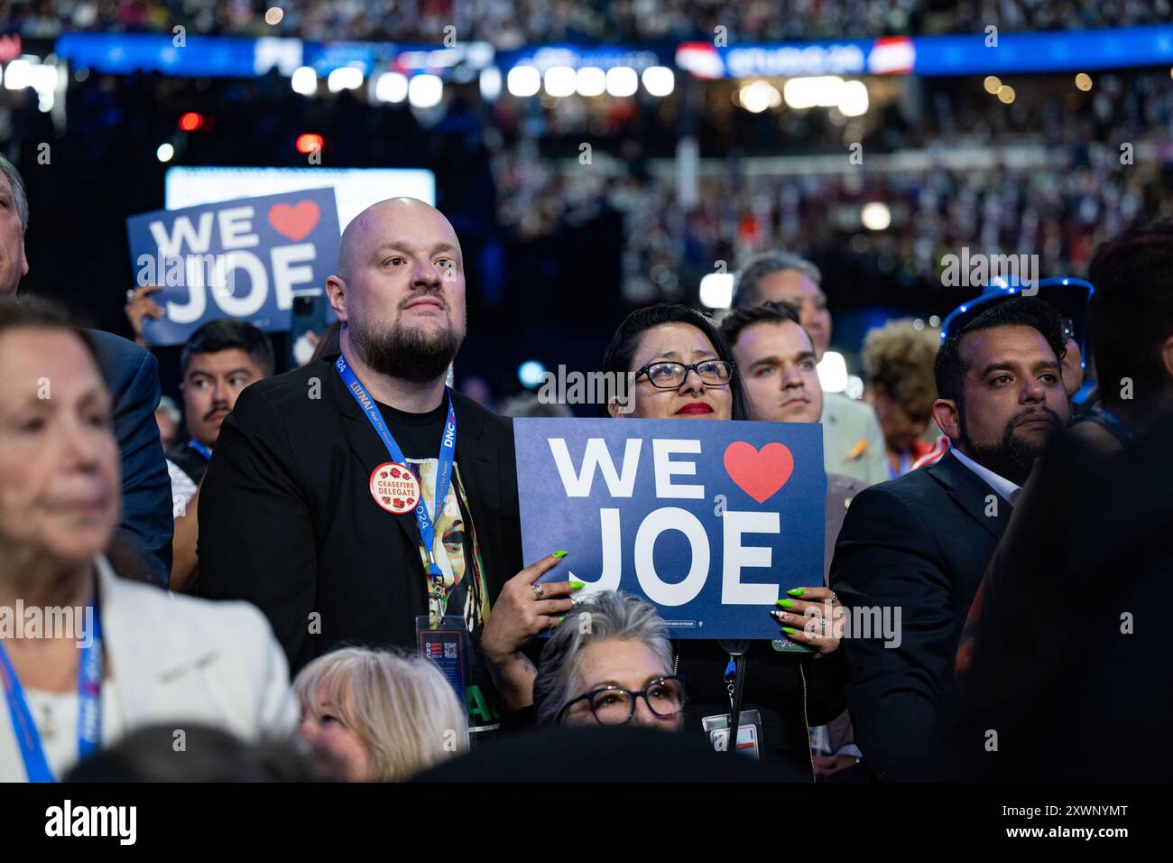 The crowd holds up signs that say “We Love Joe” as United States ...