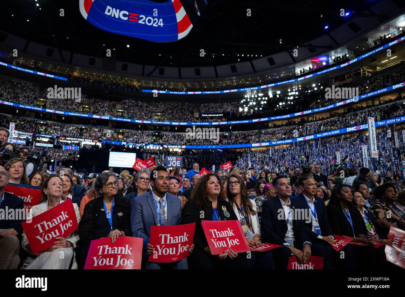 The crowd holds up signs that say “Thank You Joe” as United States ...
