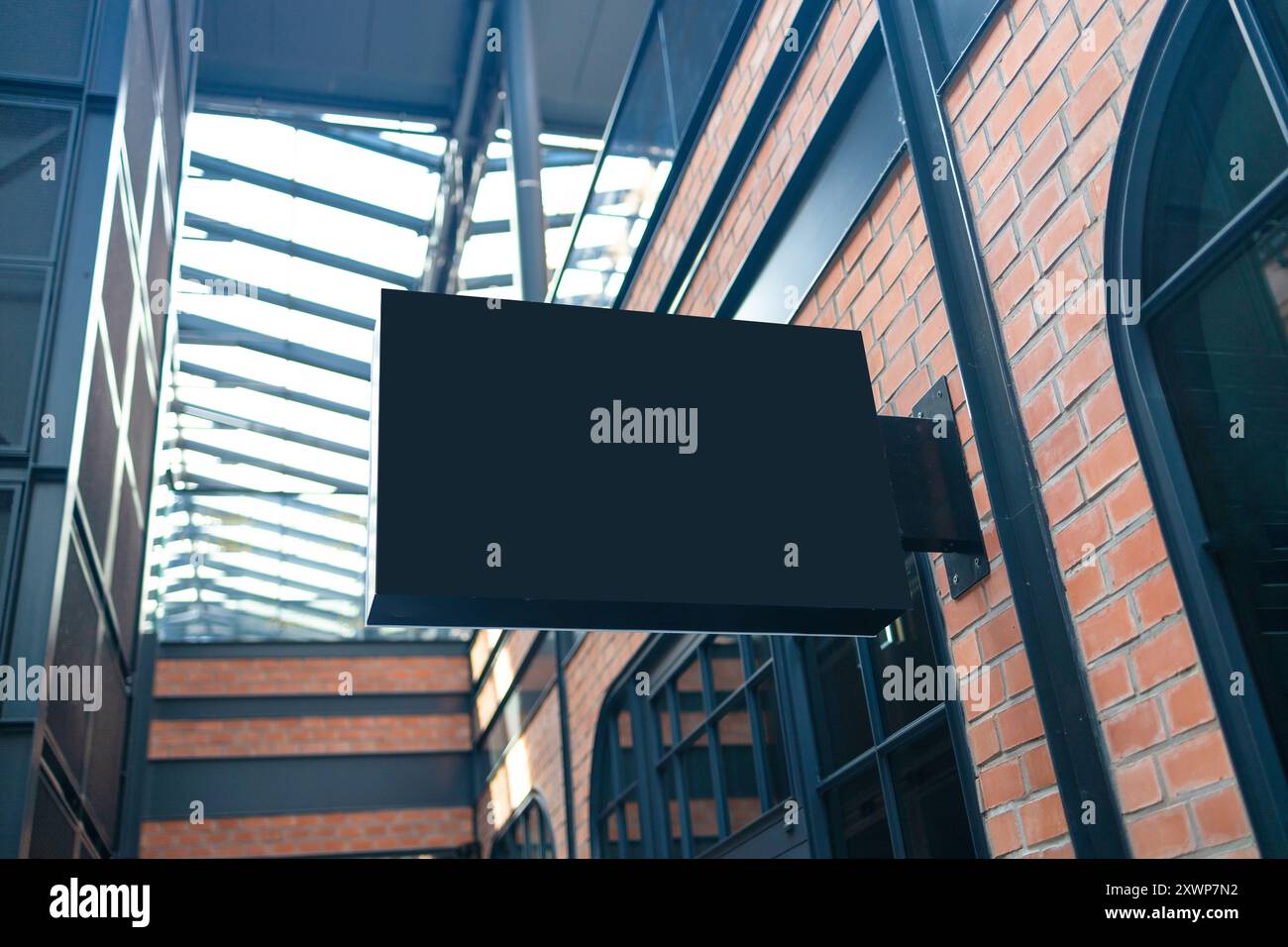 Horizontal side view of empty black signage on business skyscraper with ...