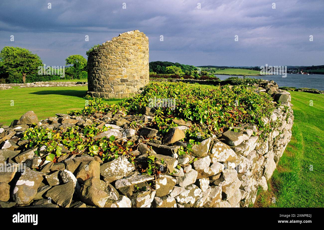 Stump of the Round Tower inside massive walls of Nendrum Monastery ...