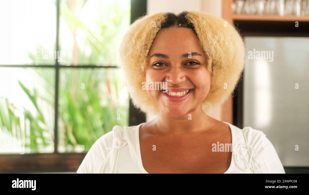 Close up portrait of an African American curvy woman with curly white afro hair Stock Photo - Alamy