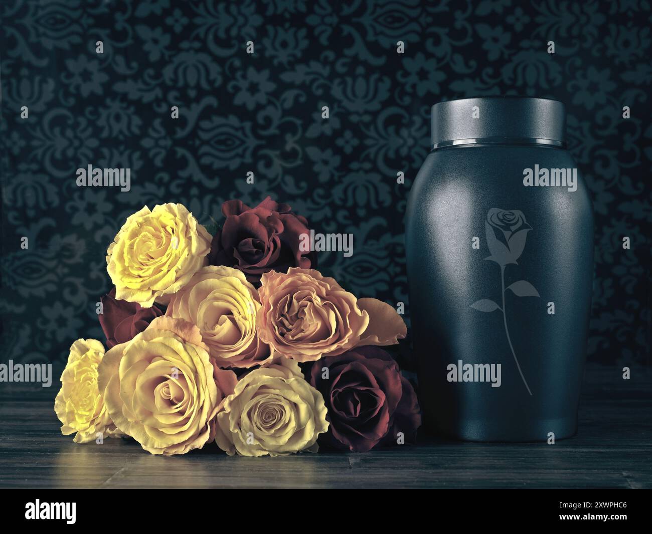 Funeral mourning urn next to a bunch of roses on dark background Stock ...