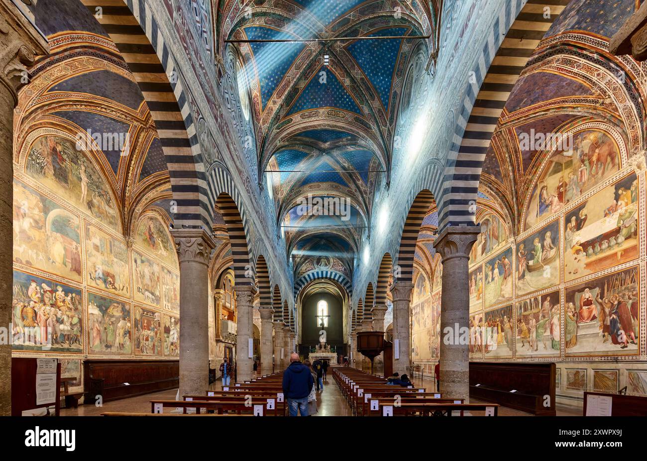 The interior with frescos of the Collegiata di Santa Maria Assunta ...