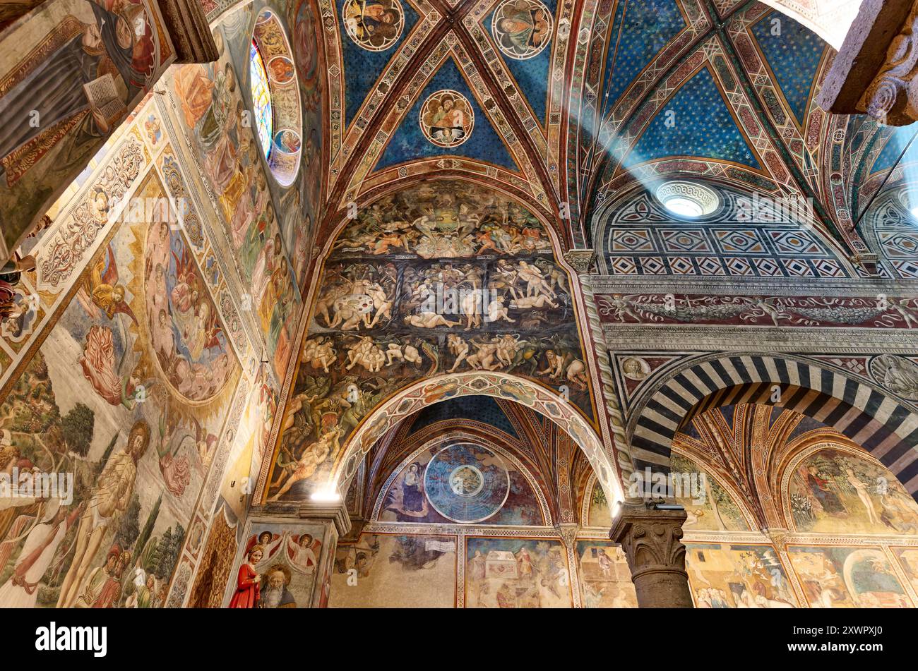 The interior with frescos of the Collegiata di Santa Maria Assunta ...