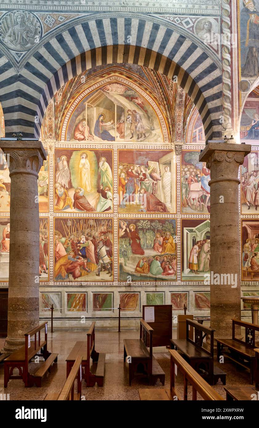 The interior with frescos of the Collegiata di Santa Maria Assunta ...
