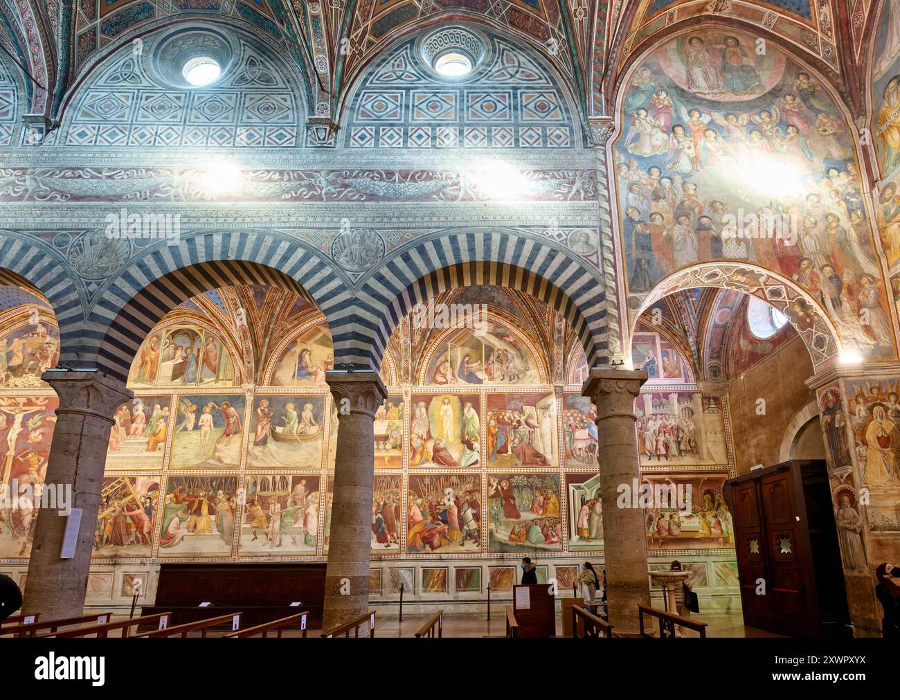 The interior with frescos of the Collegiata di Santa Maria Assunta ...