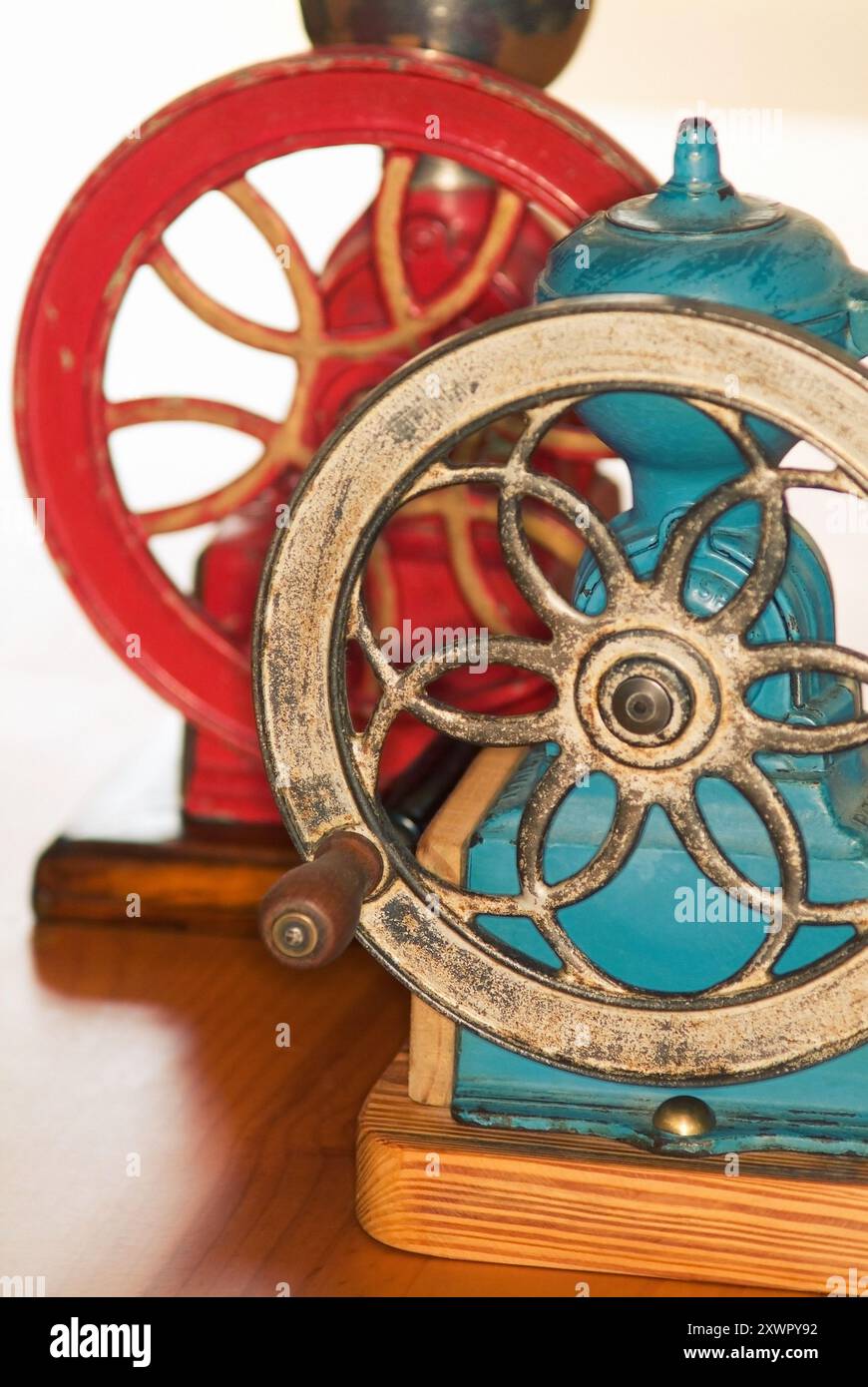Vintage wheel coffee grinder Stock Photo - Alamy