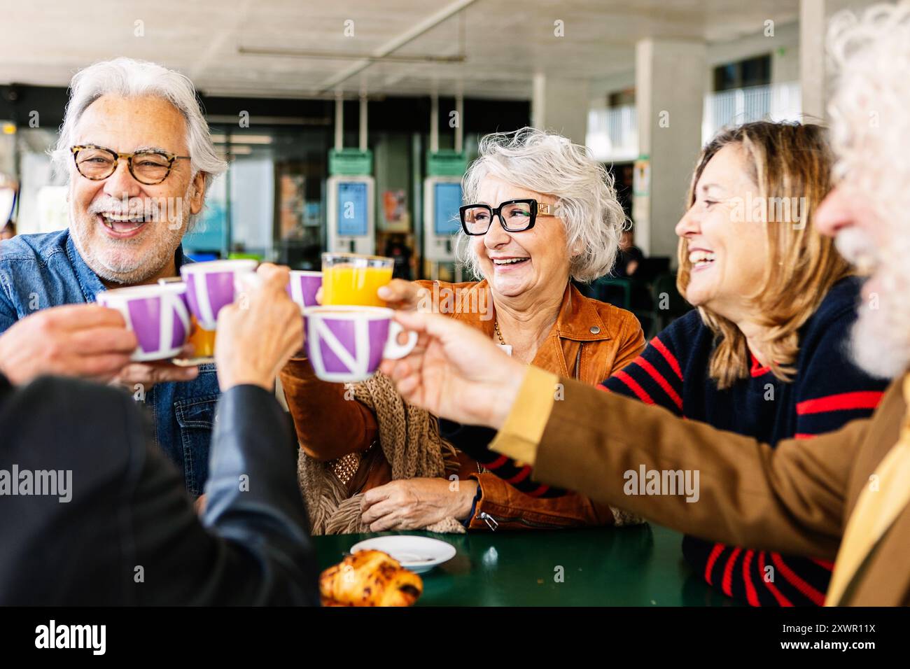 Happy group of senior people enjoying coffee at cafeteria bar Stock ...