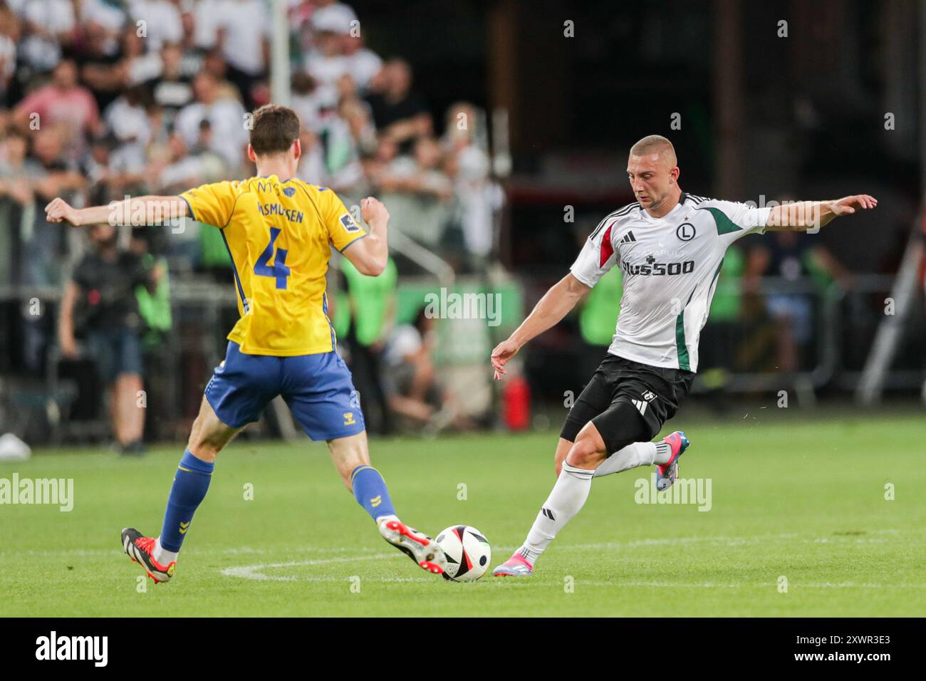 Jacob Rasmussen (L) and Blaz Kramer of Legia Warszawa (R) in action ...