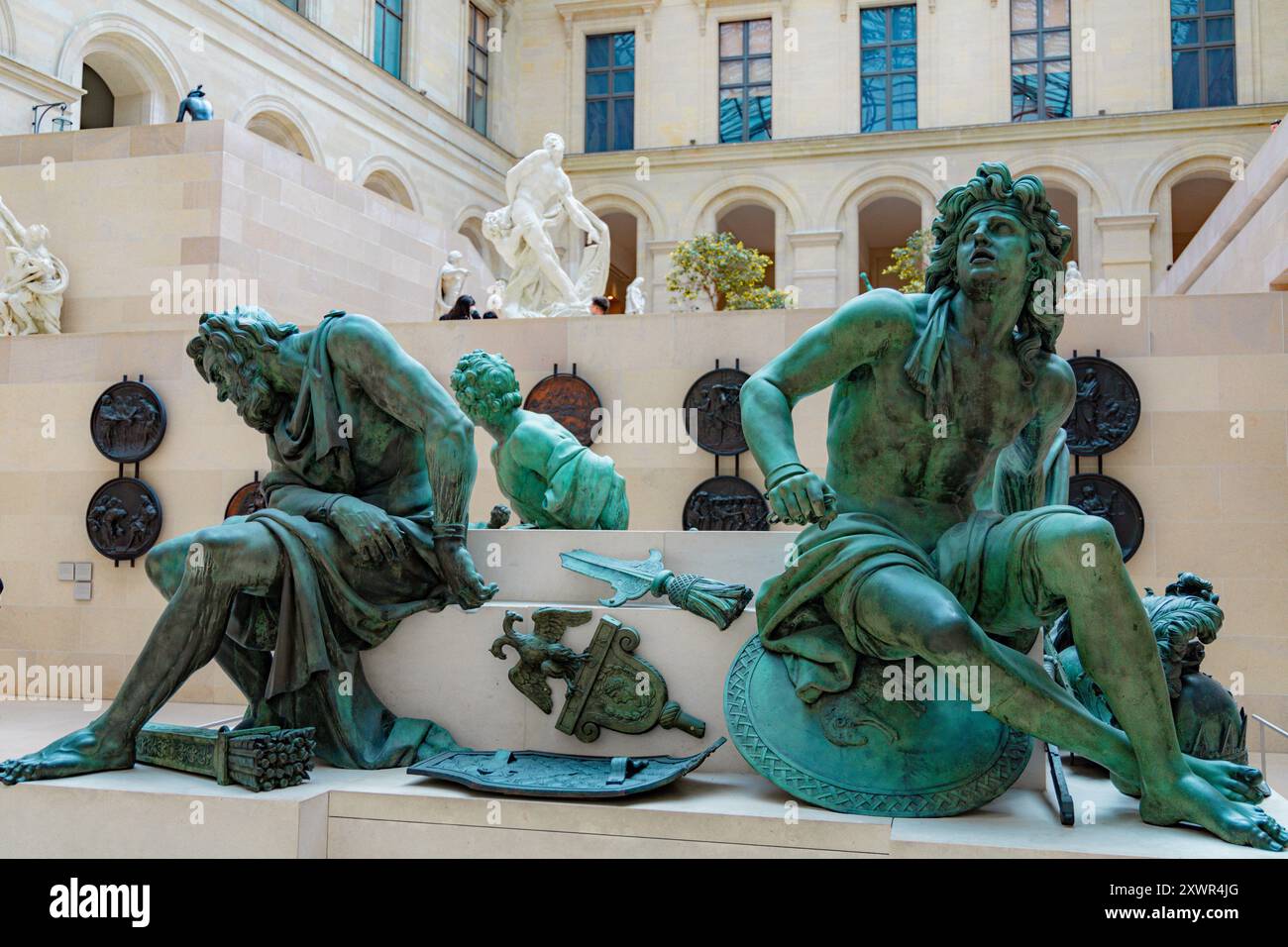 Louvre museum courtyard sculptures hi-res stock photography and images ...