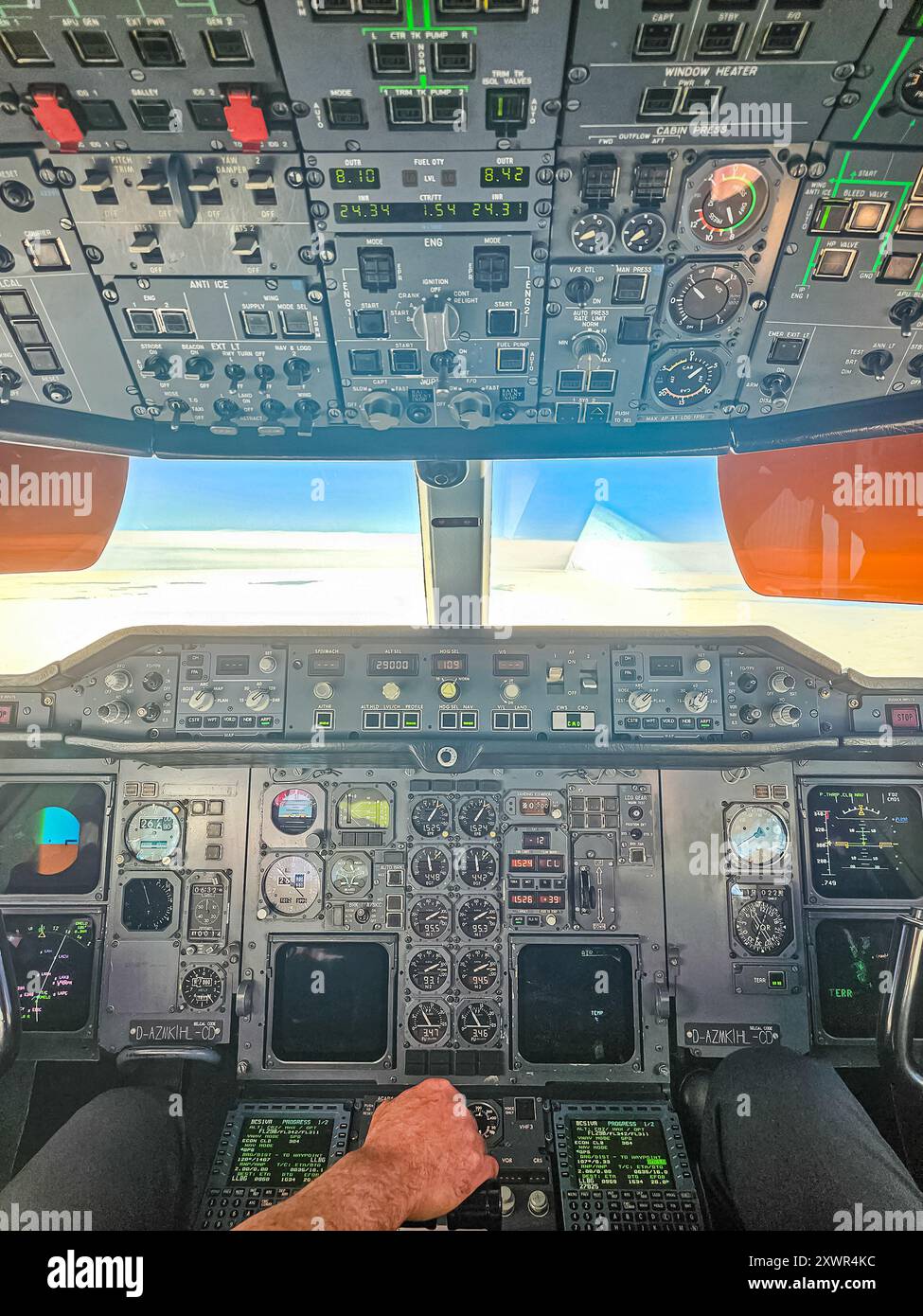 Aircraft interior, cockpit view inside the airliner. view from a pilot ...