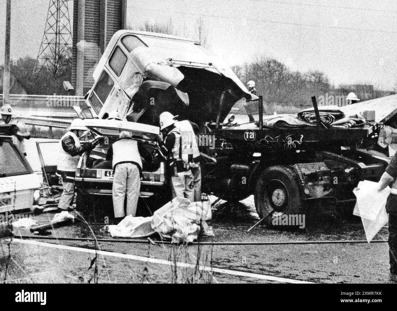 FIREMAN BATTLE TO RELEASE PEOPLE FROM THE WRECKAGE AFTER A COLLISION ...