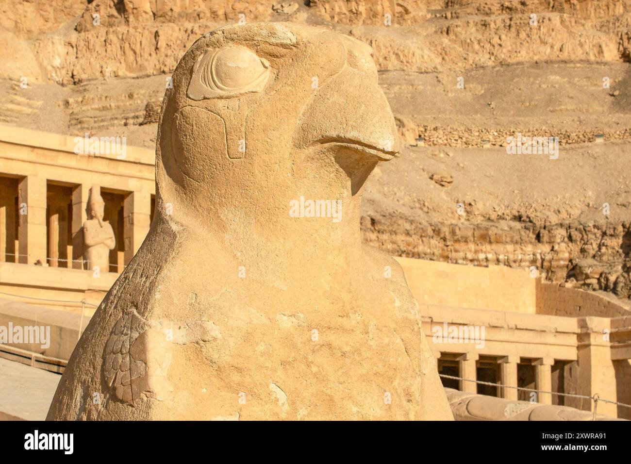 The falcon-headed god Horus stands guard at the entrance of the ...
